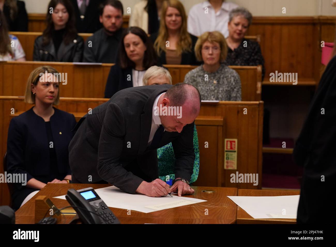 Wellbeing Economy, Fair Work and Energy Secretary, Neil Gray, is sworn ...