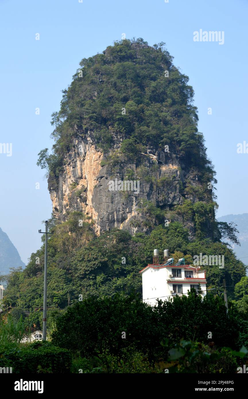 People's Republic of China, Guangxi Province, Yangshuo: a tree-covered ...