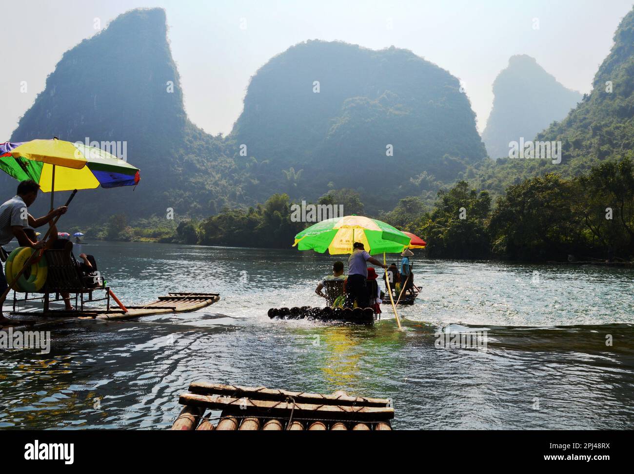 People's Republic of China, Guangxi Province, Yangshuo: bamboo rafting ...