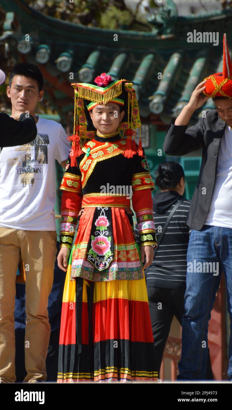 People's Republic of China, Yunnan Province, Kunming: young man being ...