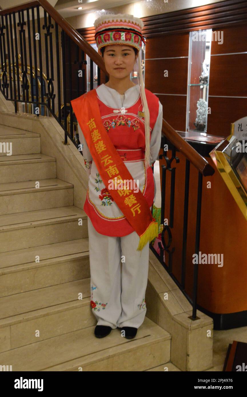 People's Republic of China, Yunnan Province, Kunming: young lady in ...