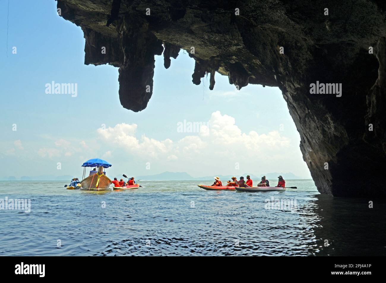 Thailand, Ao Phang-nga Marine National Park: canoes swarming through ...