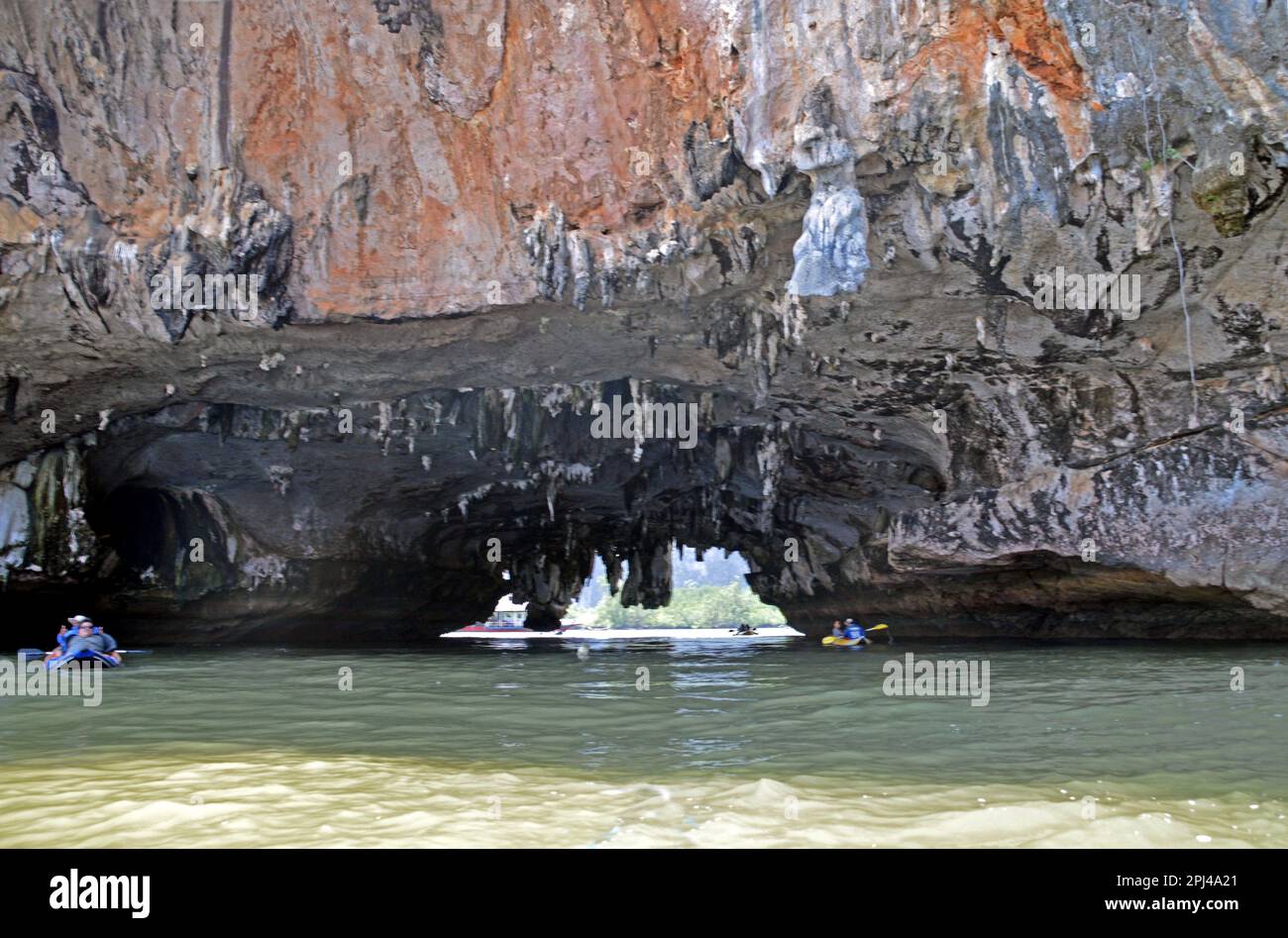Thailand, Ao Phang-nga Marine National Park: canoes coming through the ...