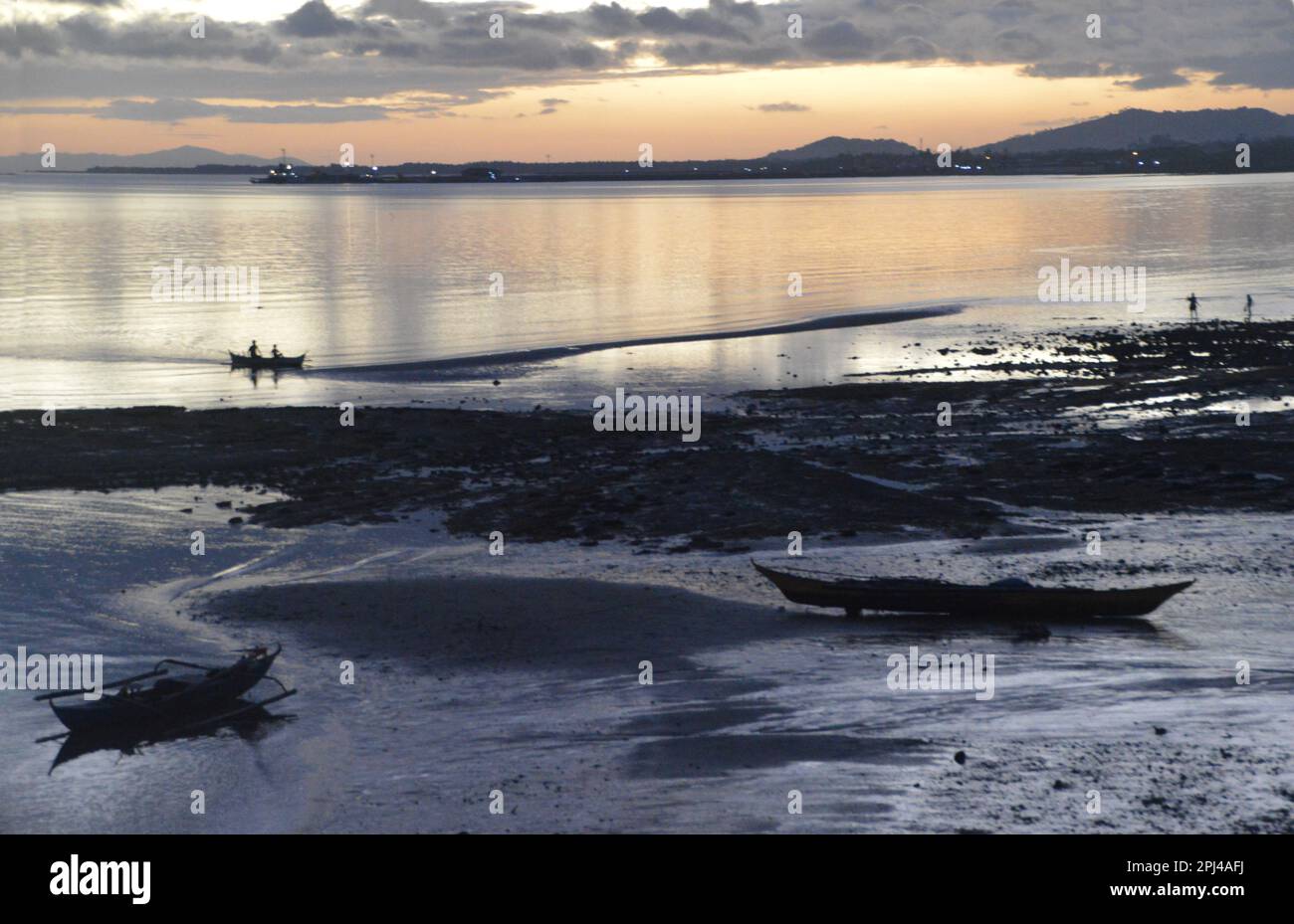 The Philippines, Samar Island, Calbayog City: tranquil scene at sunset ...