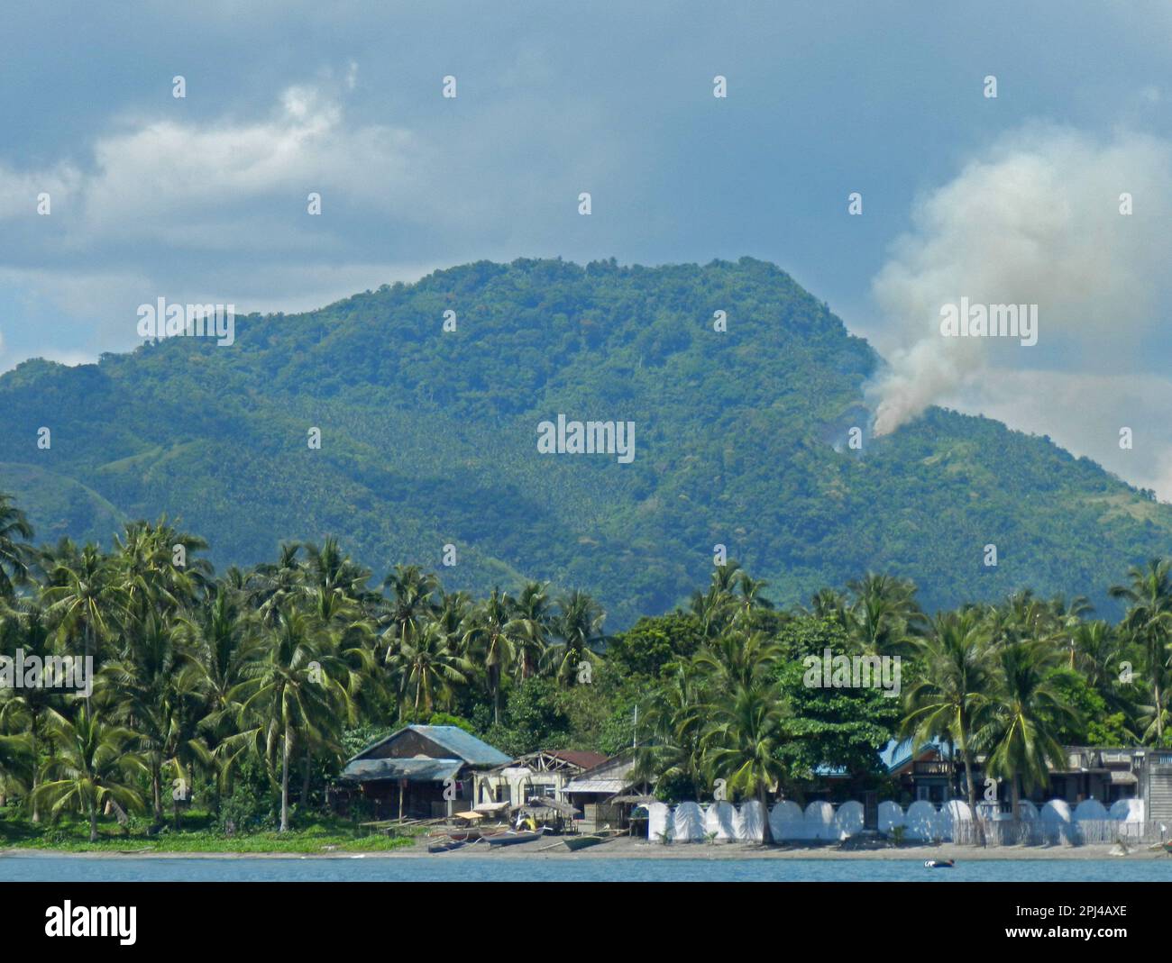 The Philippines, Samar Island: Malajog Beach. with its thickly wooded ...