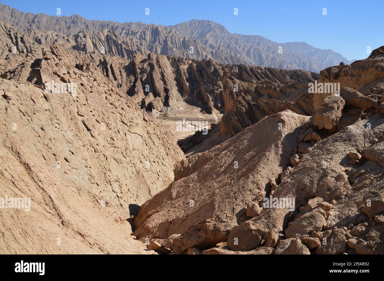 People's Republic of China, Xinjiang Province: rugged, barren scenery ...