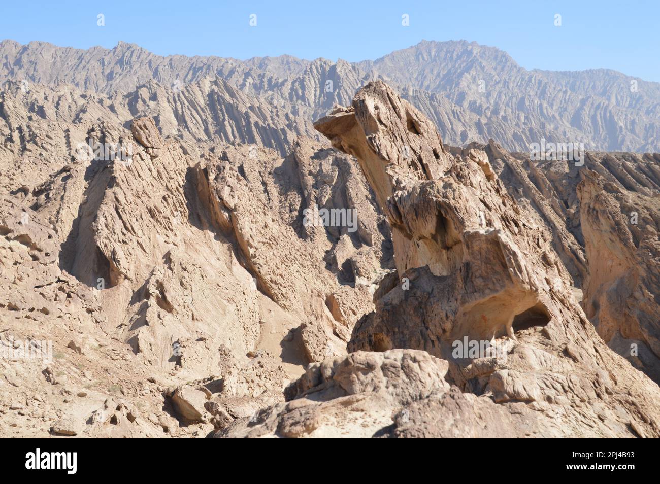 People's Republic of China, Xinjiang Province: rugged, barren scenery ...