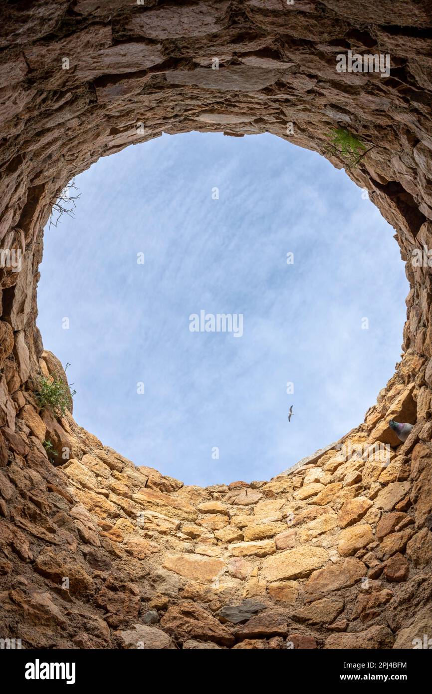 Stone pit. View of the sky from inside a stone pit. Symbolic to ...
