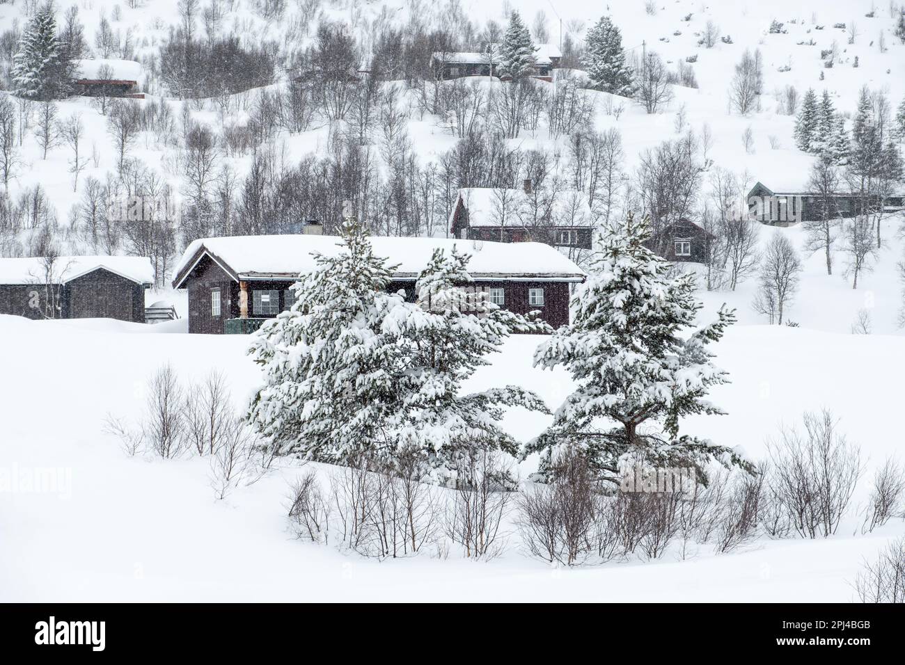 Cabins in the winter mountains of the Jotunheimen region of Norway ...