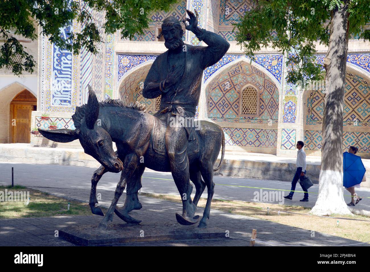 Uzbekistan, Bukhara: bronze statue of Nasruddin Hodja on his mule in ...