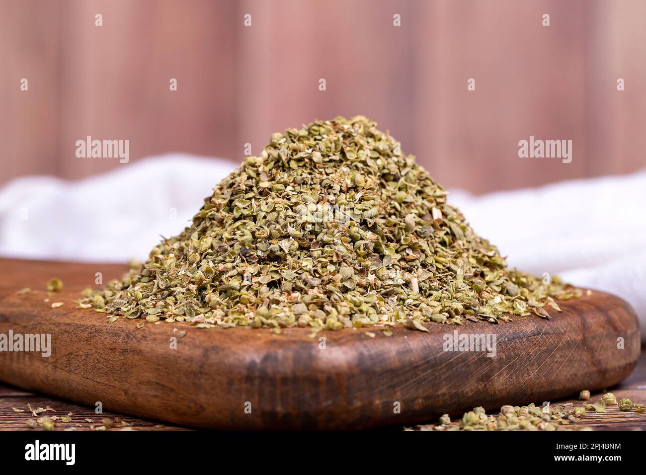 Thyme spice. Wood serving board Dried Thyme leaf. Spice concept. Close ...