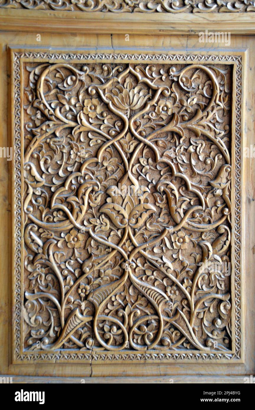 Uzbekistan, Samarkand, Registan: carved wooden door panel with floral ...
