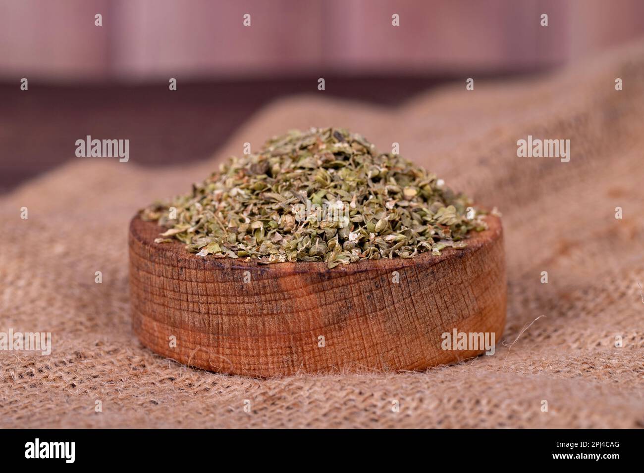 Thyme spice. Dried Thyme leaf in bowl on wood background. Spice concept ...