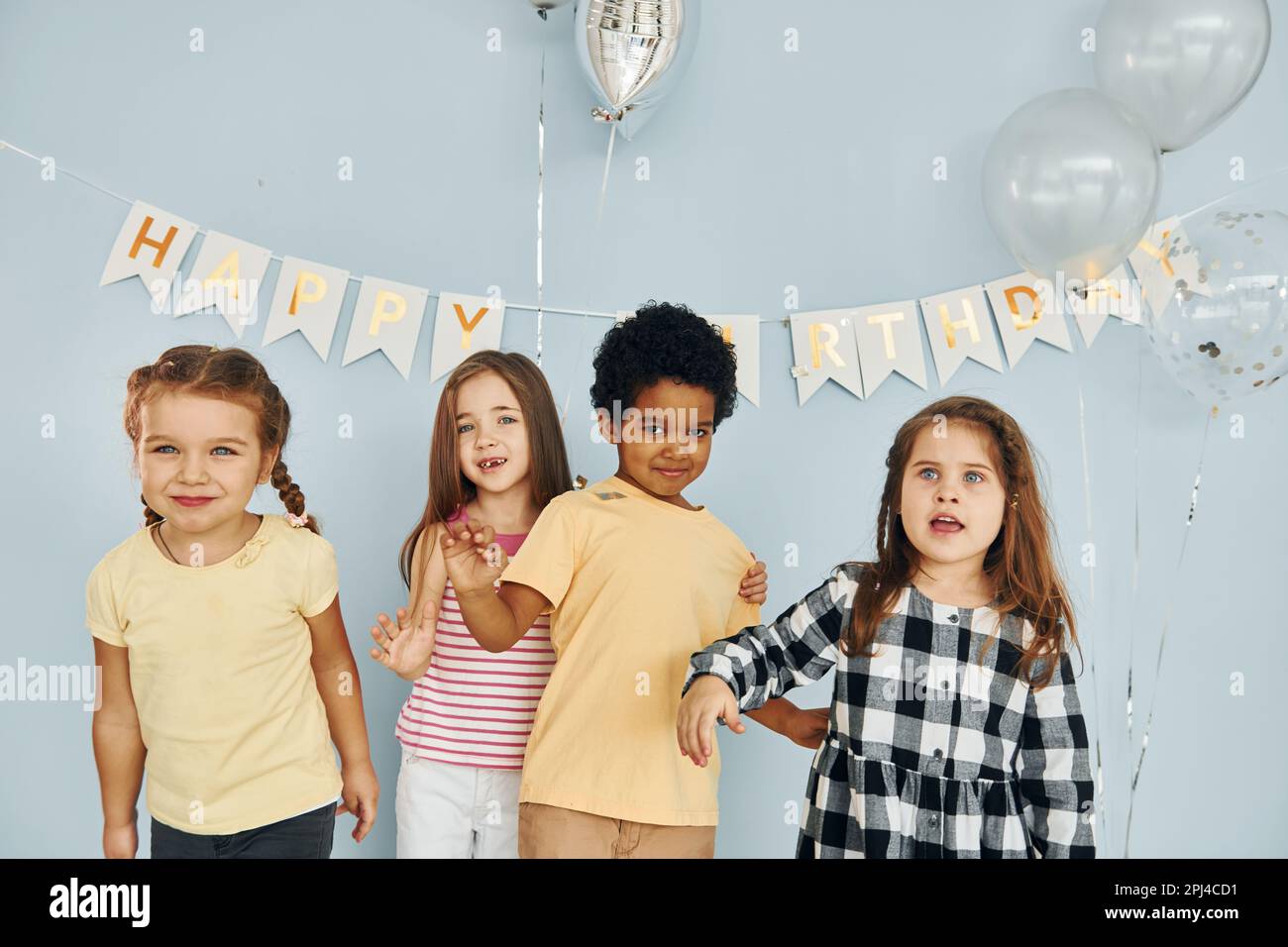 Children on celebrating birthday party indoors have fun together Stock ...