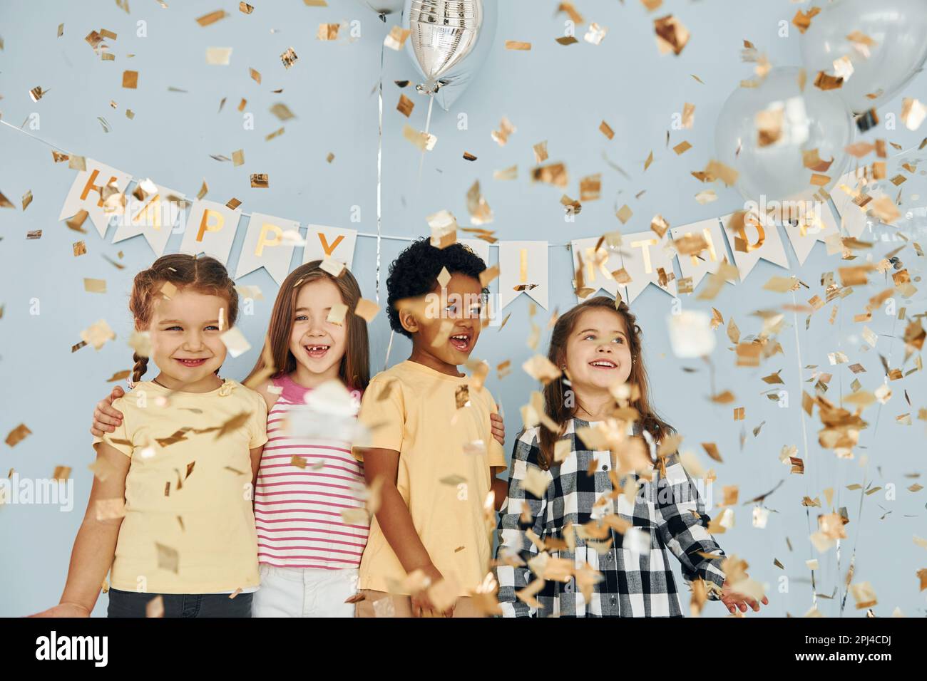 Children on celebrating birthday party indoors have fun together Stock ...