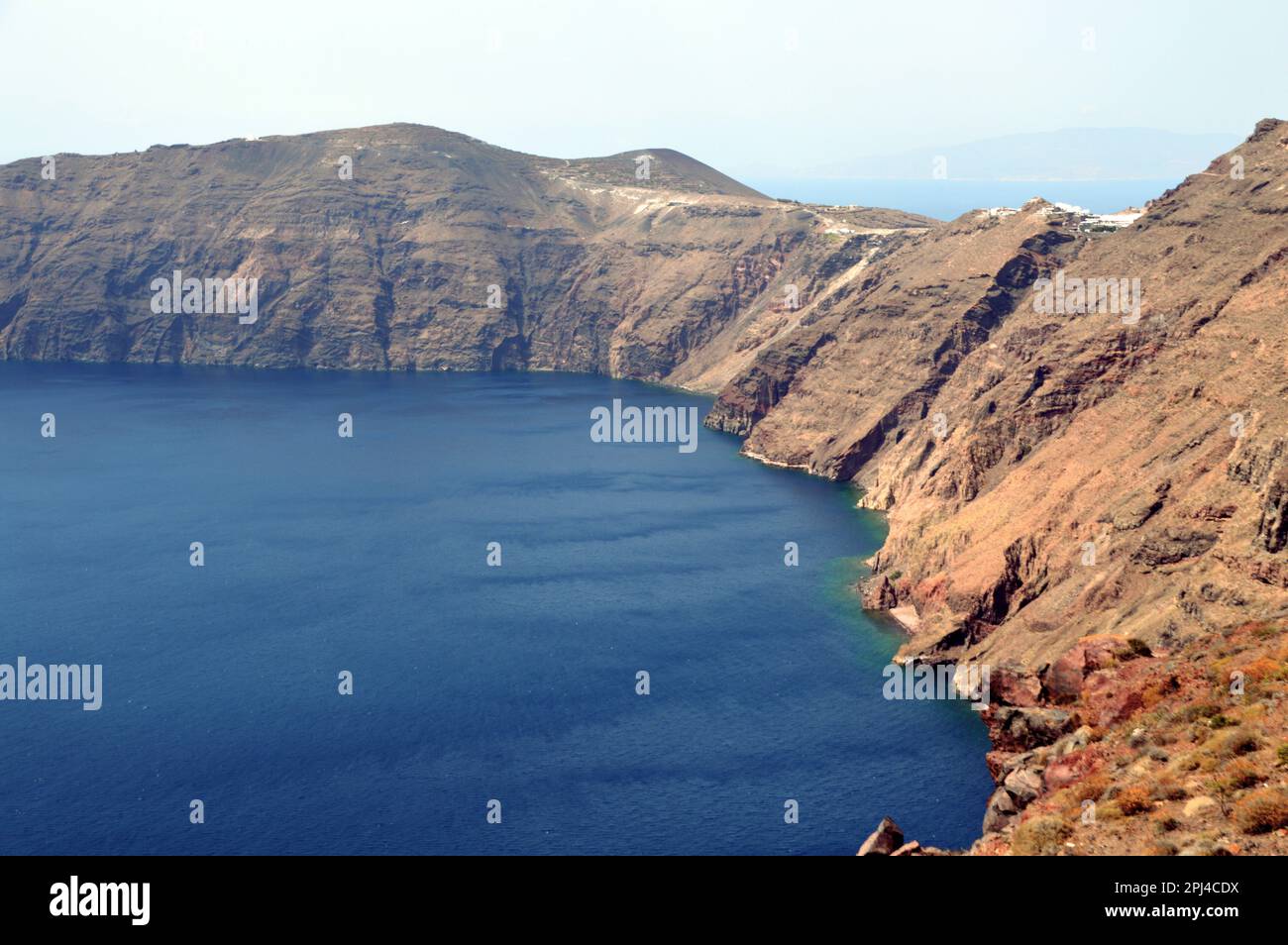 Greece, Island of Santorini: view of the steep lip of the ex-volcano at ...