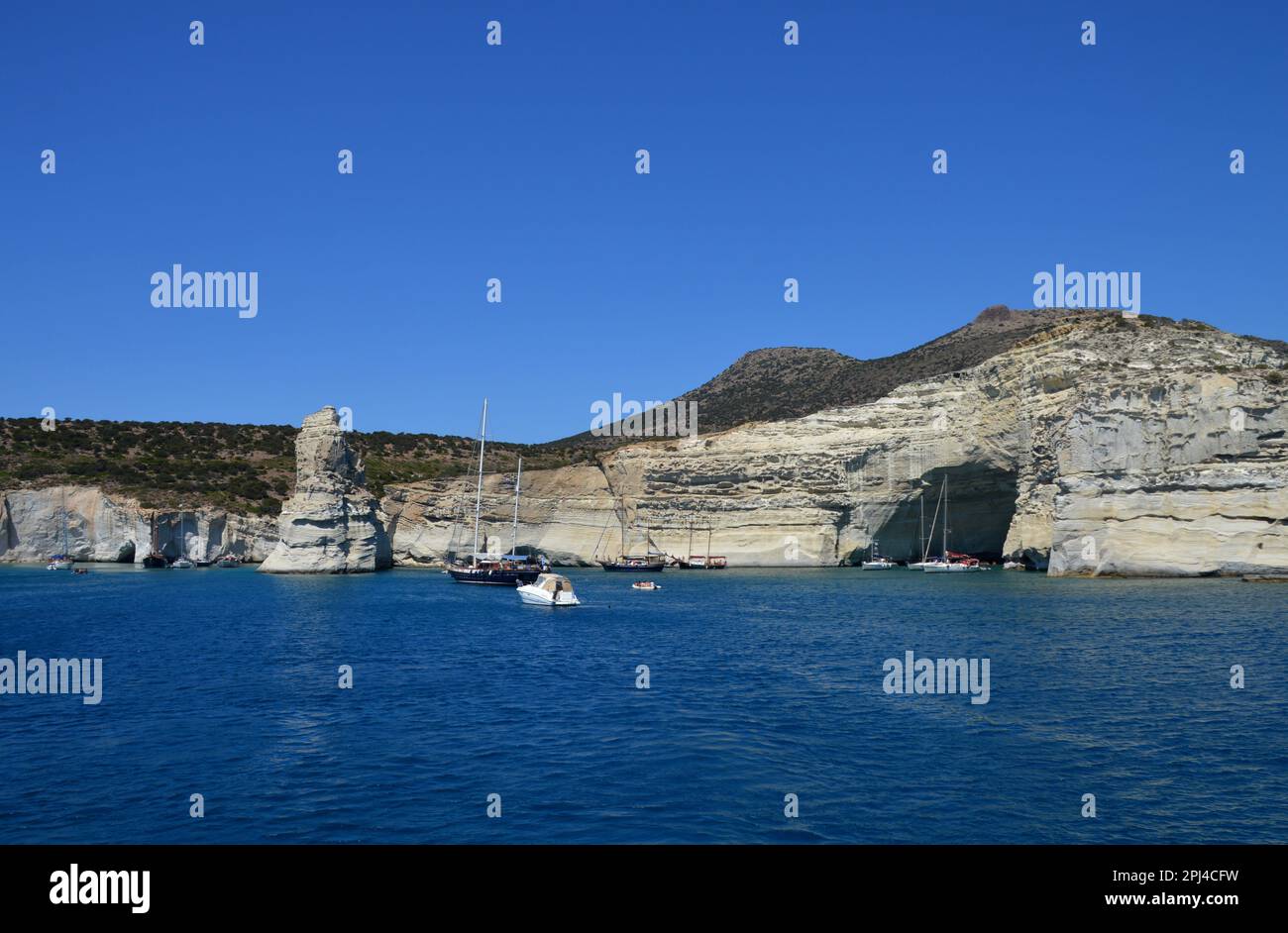 Greece, Island of Milos: the white, volcanic cliffs, rock formations ...