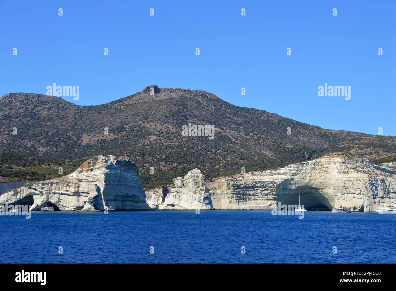 Greece, Island of Milos: the white, volcanic cliffs, rock formations ...