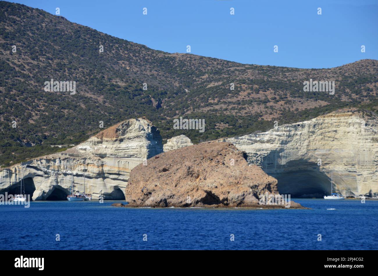 Greece, Island of Milos: the white, volcanic cliffs, rock formations ...