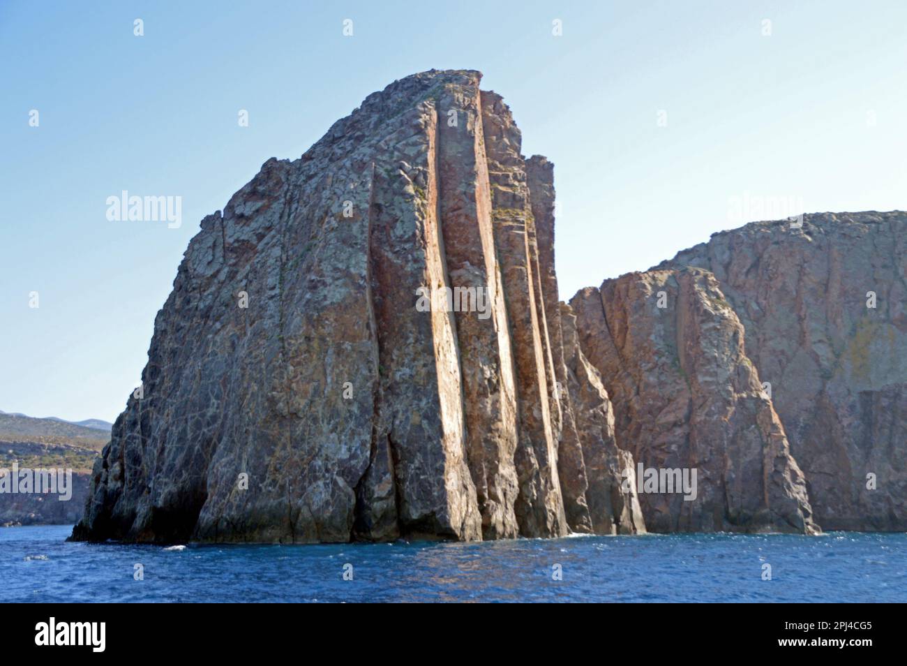 Greece, Island of Milos: rising abruptly from the sea, this volcanic ...