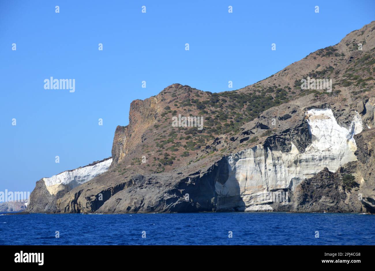 Greece, Island of Milos: the white, volcanic cliffs, rock formations ...