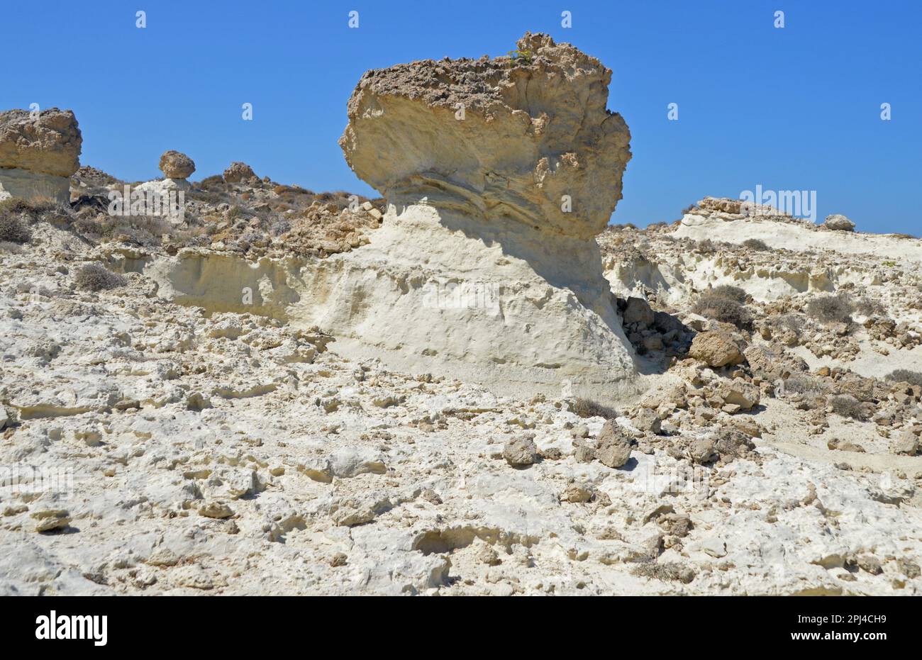 Greece, Island of Milos: the white volcanic rocks at Sarakiniko. on the ...