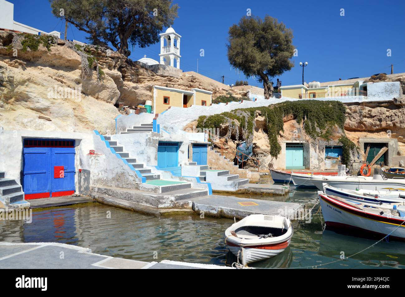 Greece, Island of Milos: the tiny inner harbour at Mandrakia, a fishing ...