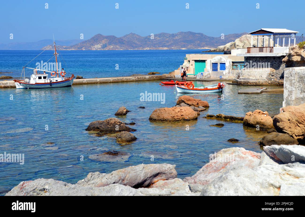 Greece, Island of Milos: the outer harbour at Mandrakia, a fishing ...
