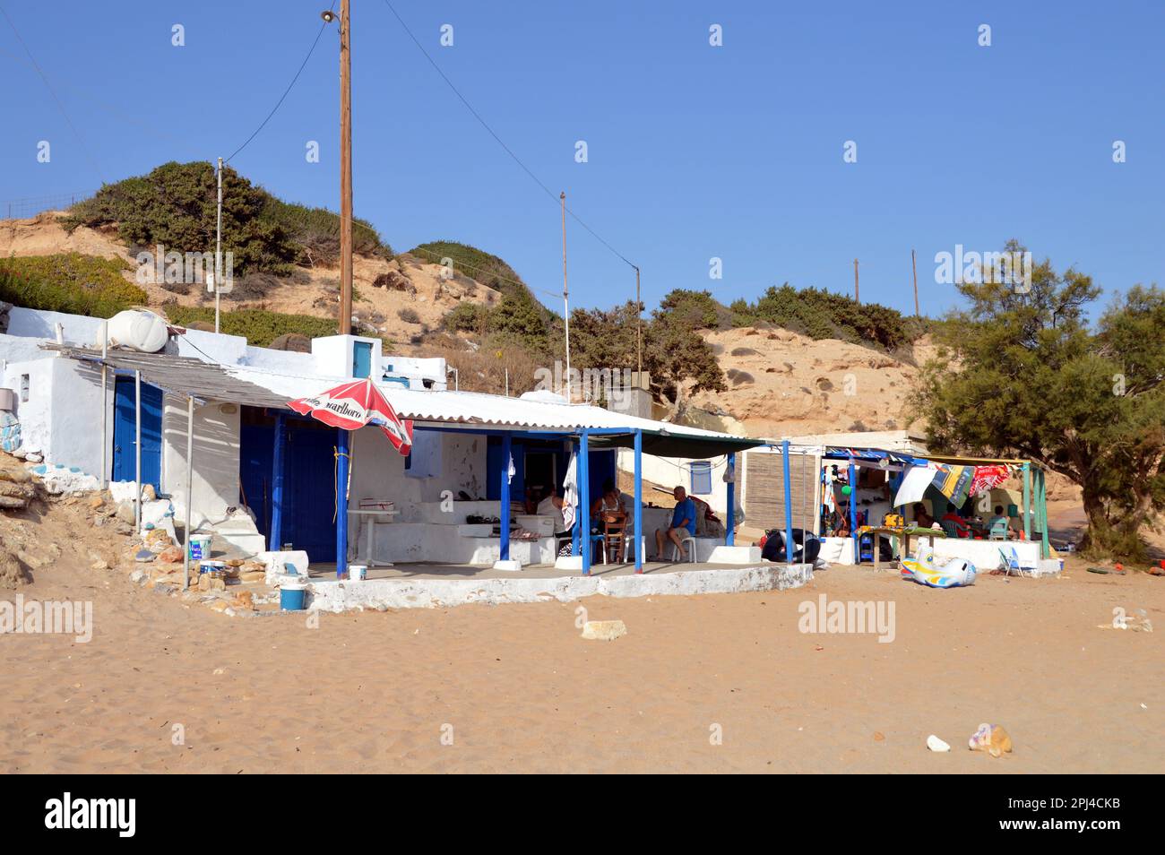 Greece, Island of Milos: beach houses at Provatas, on the south coast ...
