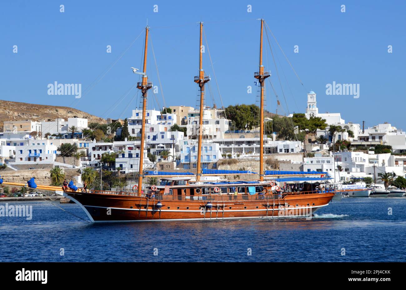 Greece, Island of Milos: sailing ship Bahriyeli leaving the harbour of ...