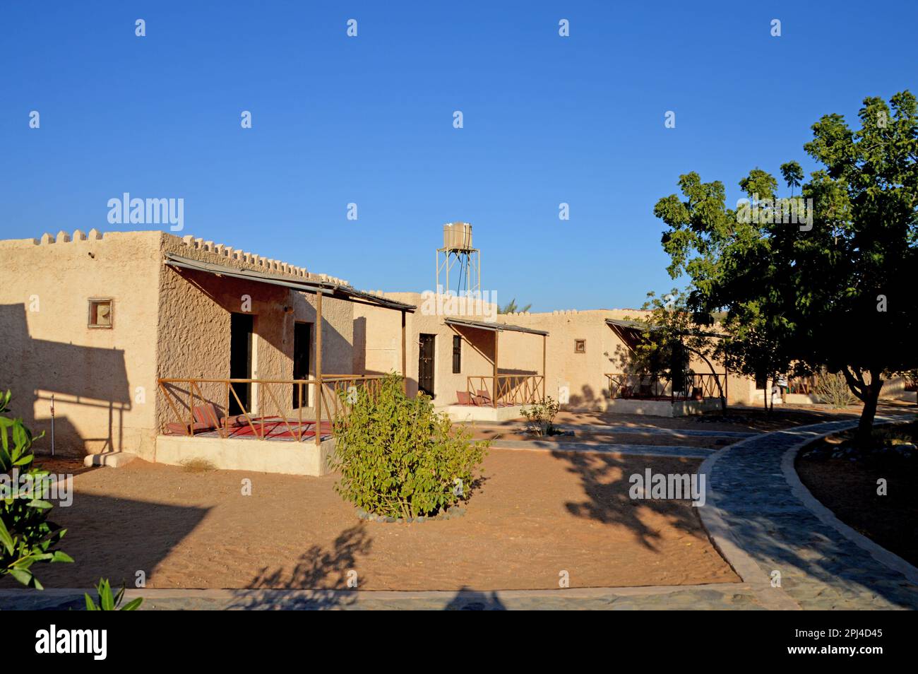 Oman, Sama Al Wasil Desert Camp: overnight cabins arranged in a circle ...