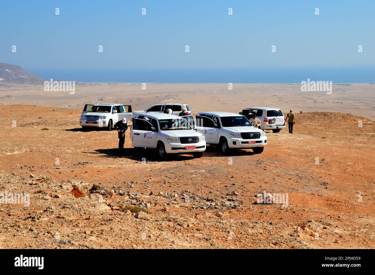 Oman, Sawqirah: Landcruisers on the spectacular limestone escarpment ...