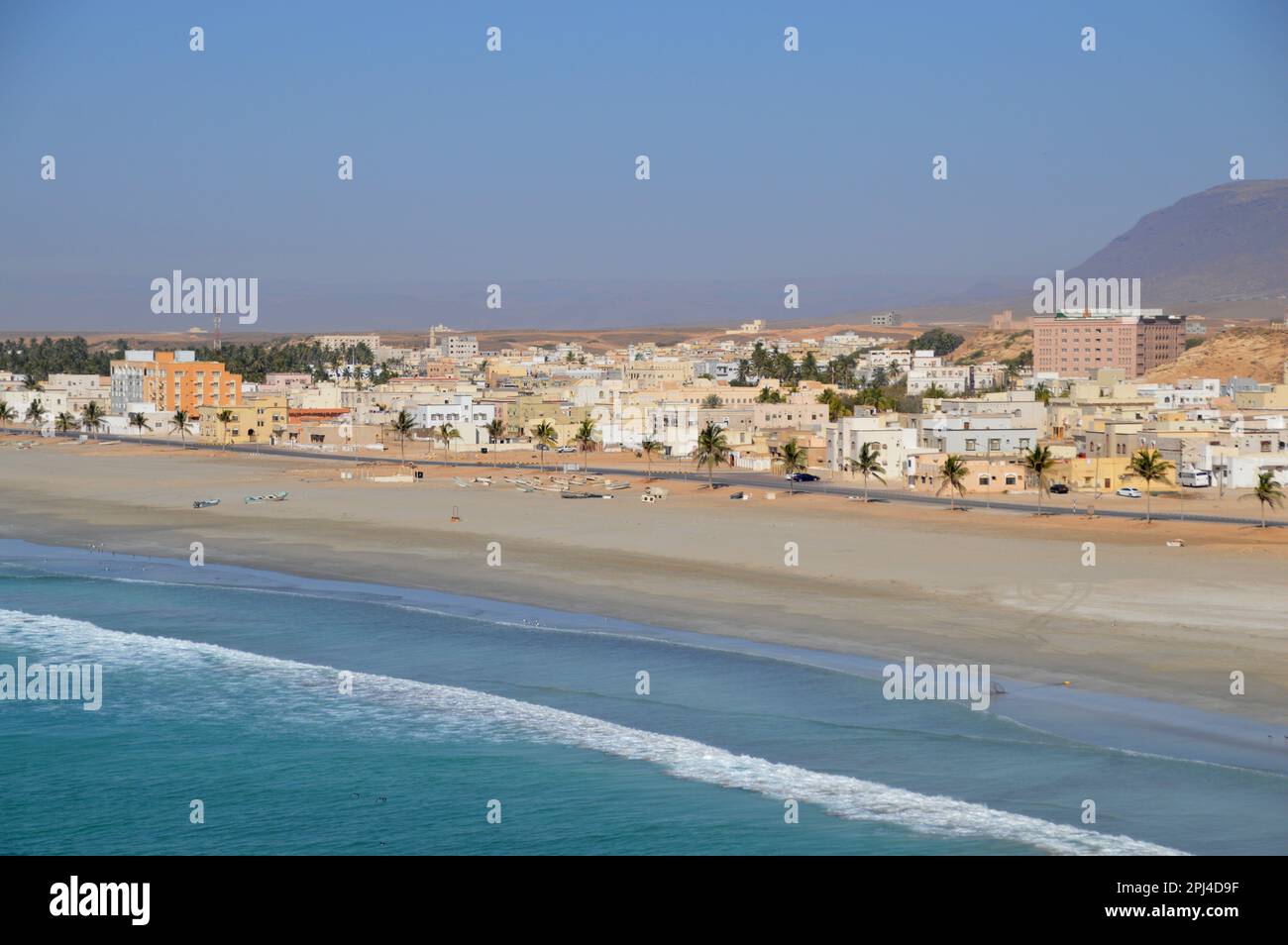 Oman, Taqah: view of the town and its beach from a look-out point on ...