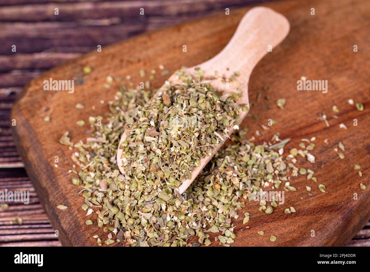 Thyme spice. Dried Thyme leaf in wooden spoon on wood background. Spice ...