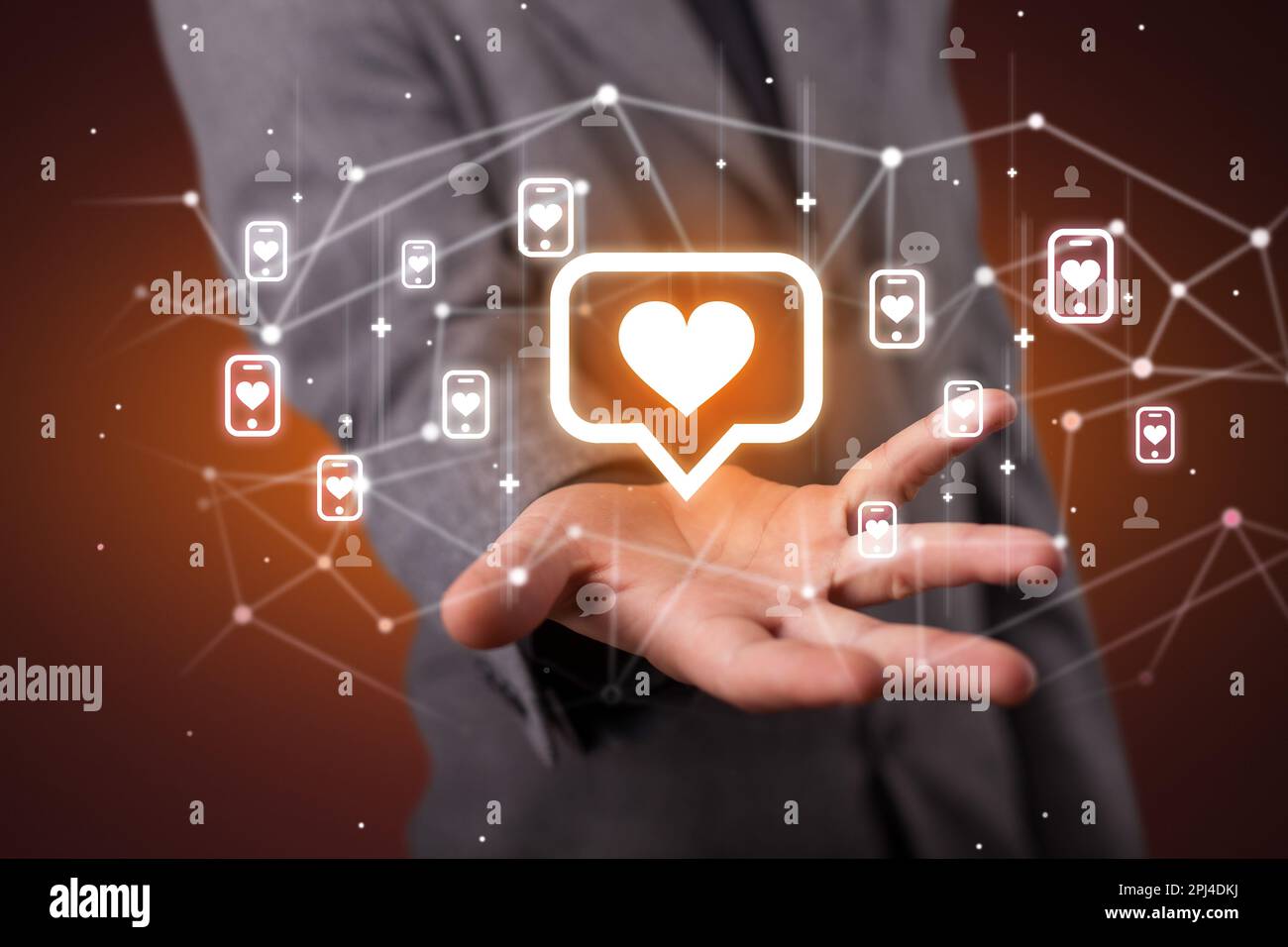 Hand holding social media icons Stock Photo - Alamy