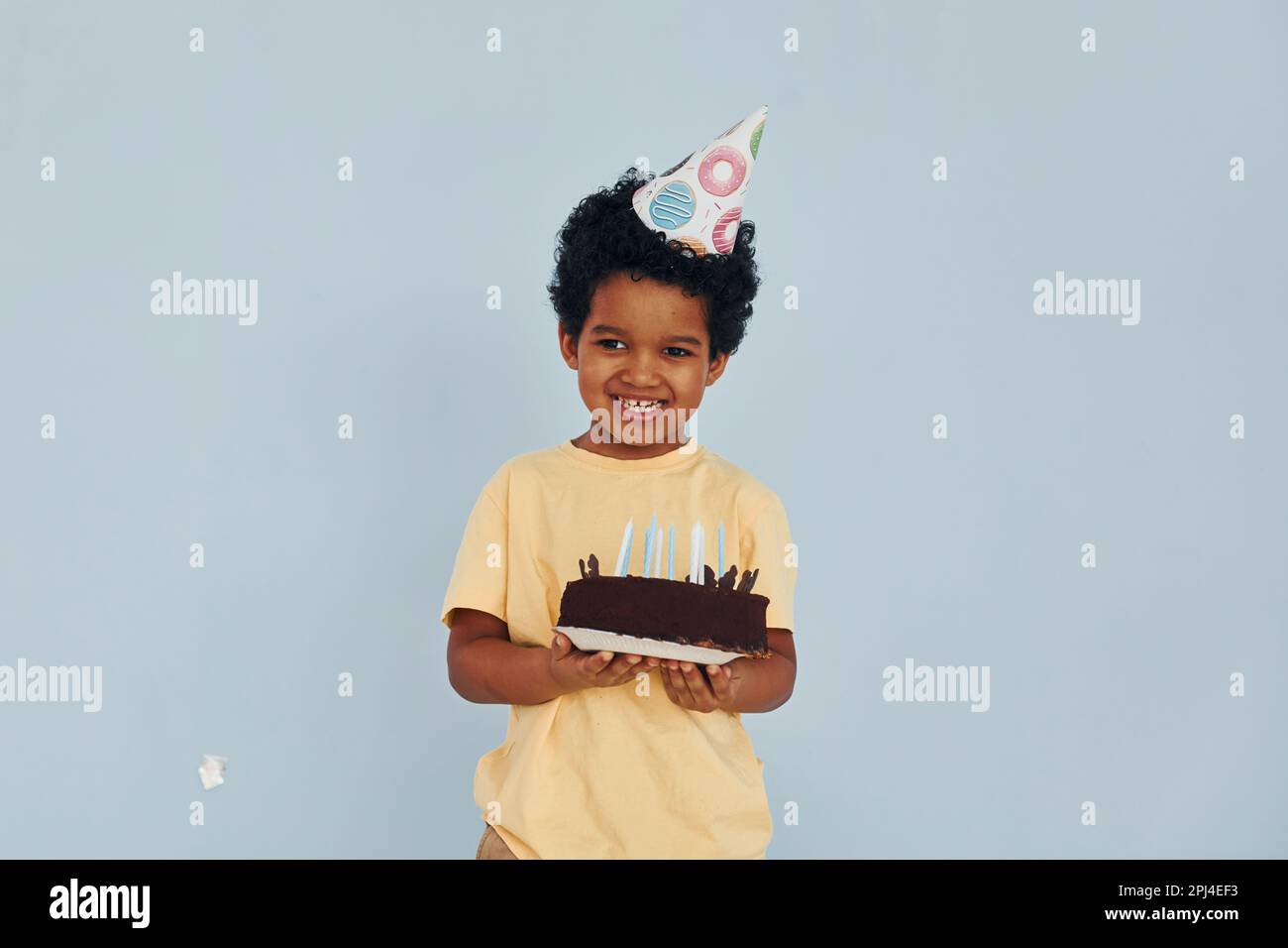 Happy little african american kid have fun indoors at birthday party ...
