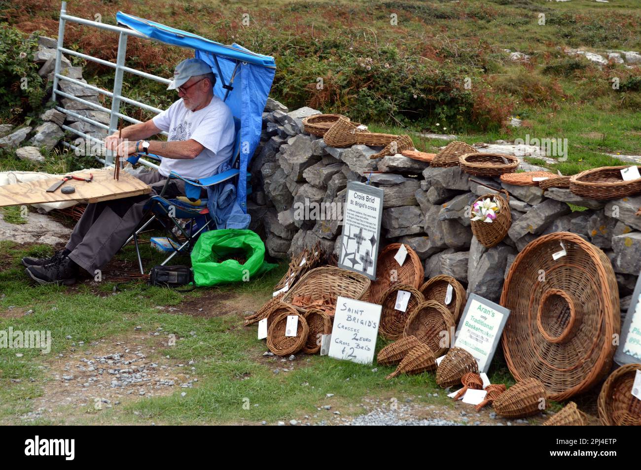 Ireland, Aran Islands, Inis Mor, Kilmurvey: the basketmaker offers a ...