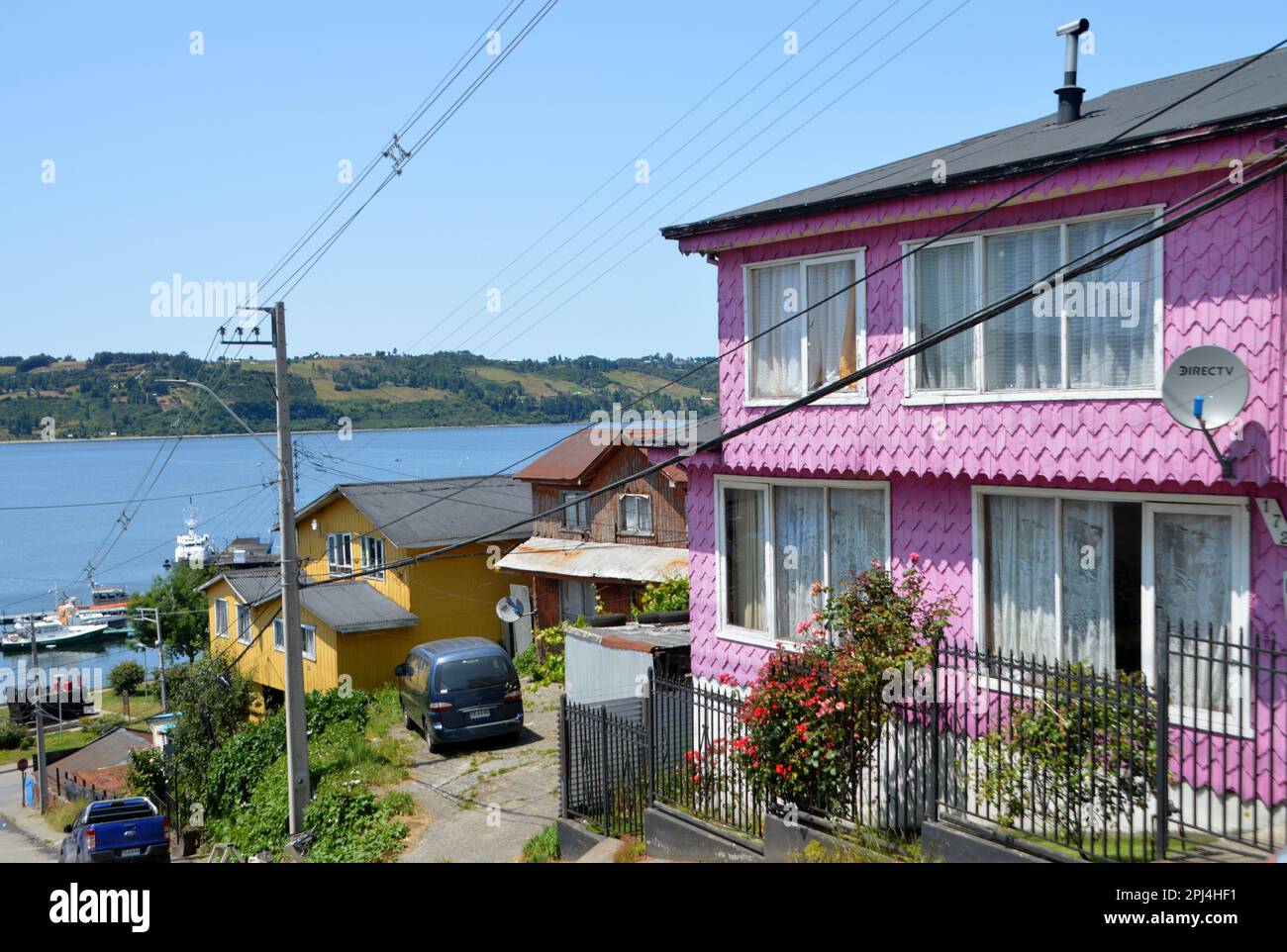 Chile. Chiloe, Castro: a house overlooking the port, with typical ...