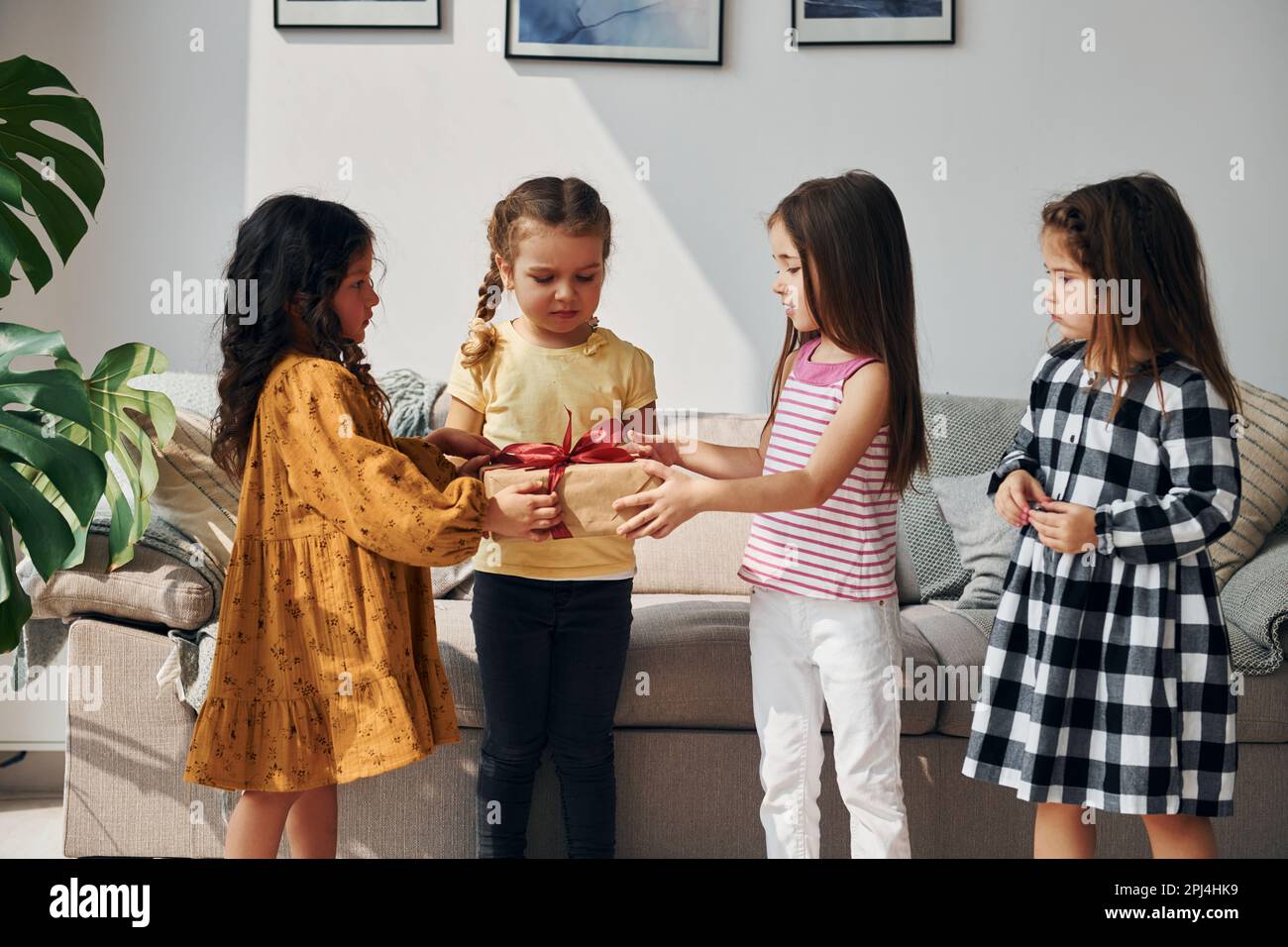 At home. Children on celebrating birthday party indoors have fun ...