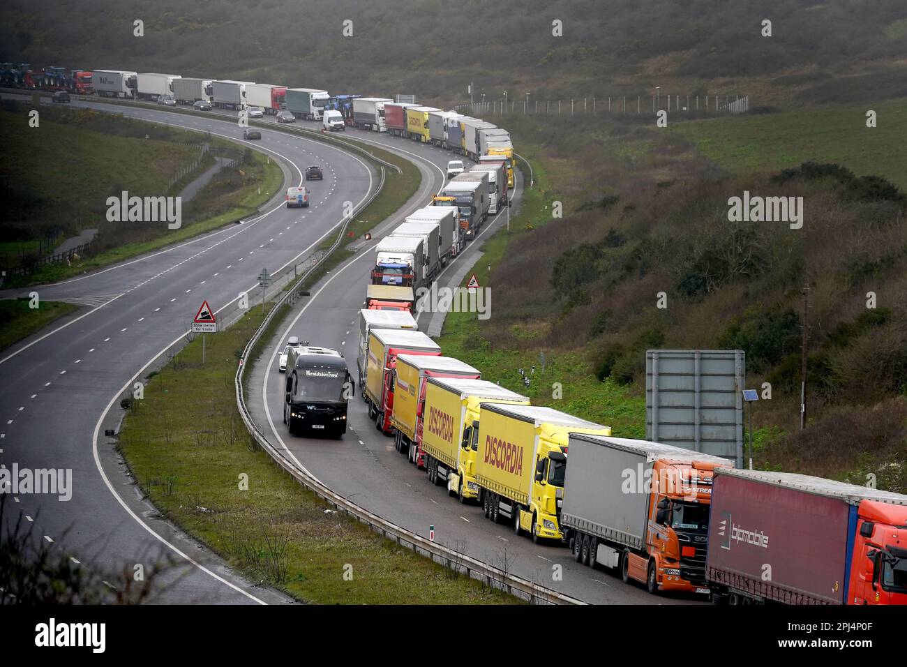 Lorries queue for the Port of Dover along the A20 in Kent as strong ...