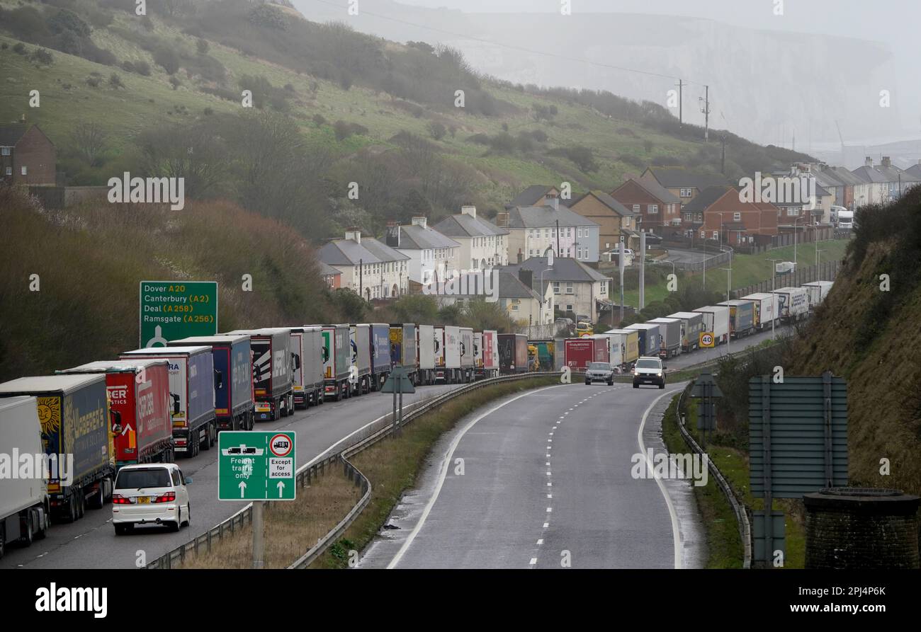 Lorries queue for the Port of Dover along the A20 in Kent as strong ...