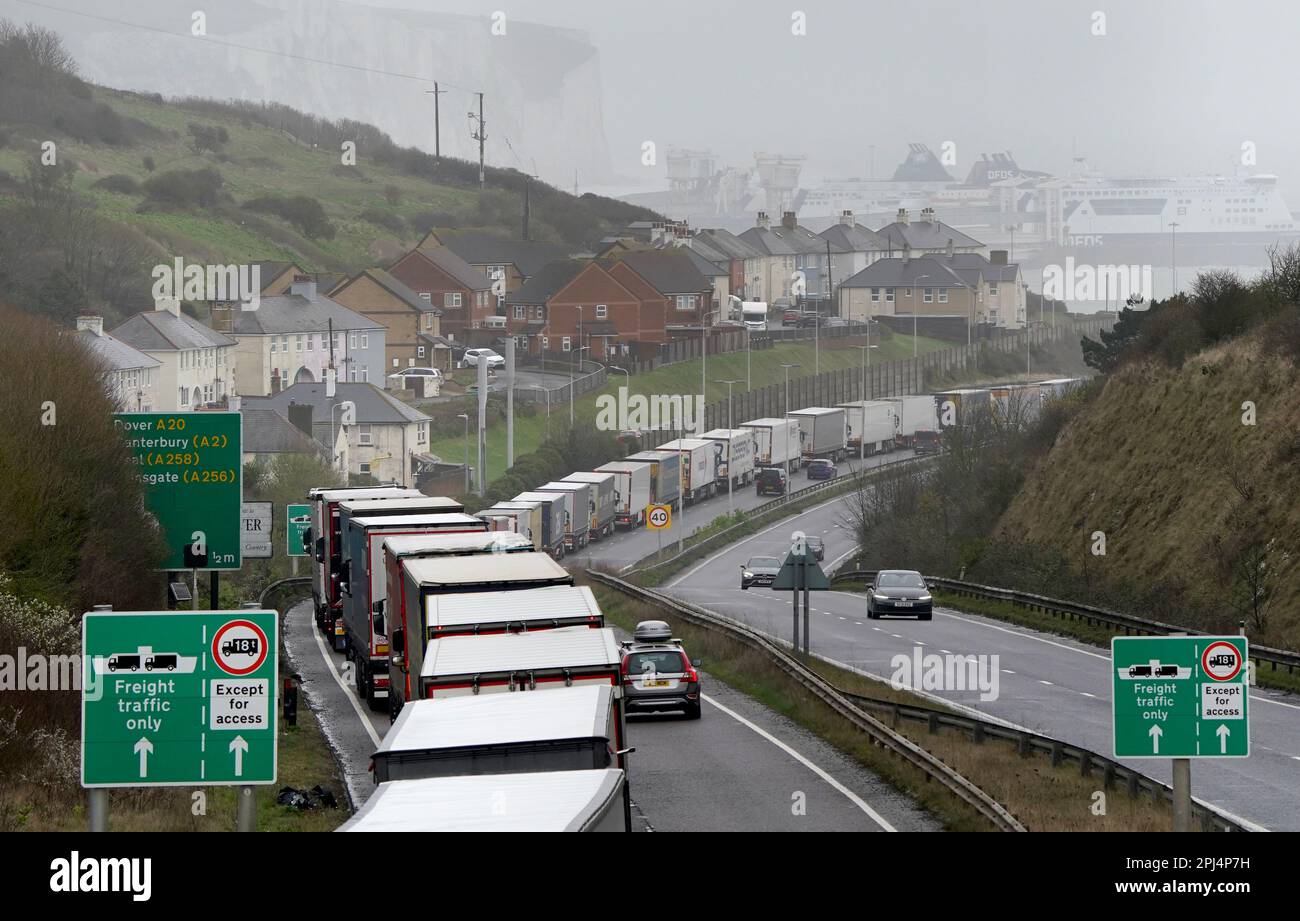Lorries queue for the Port of Dover along the A20 in Kent as strong ...