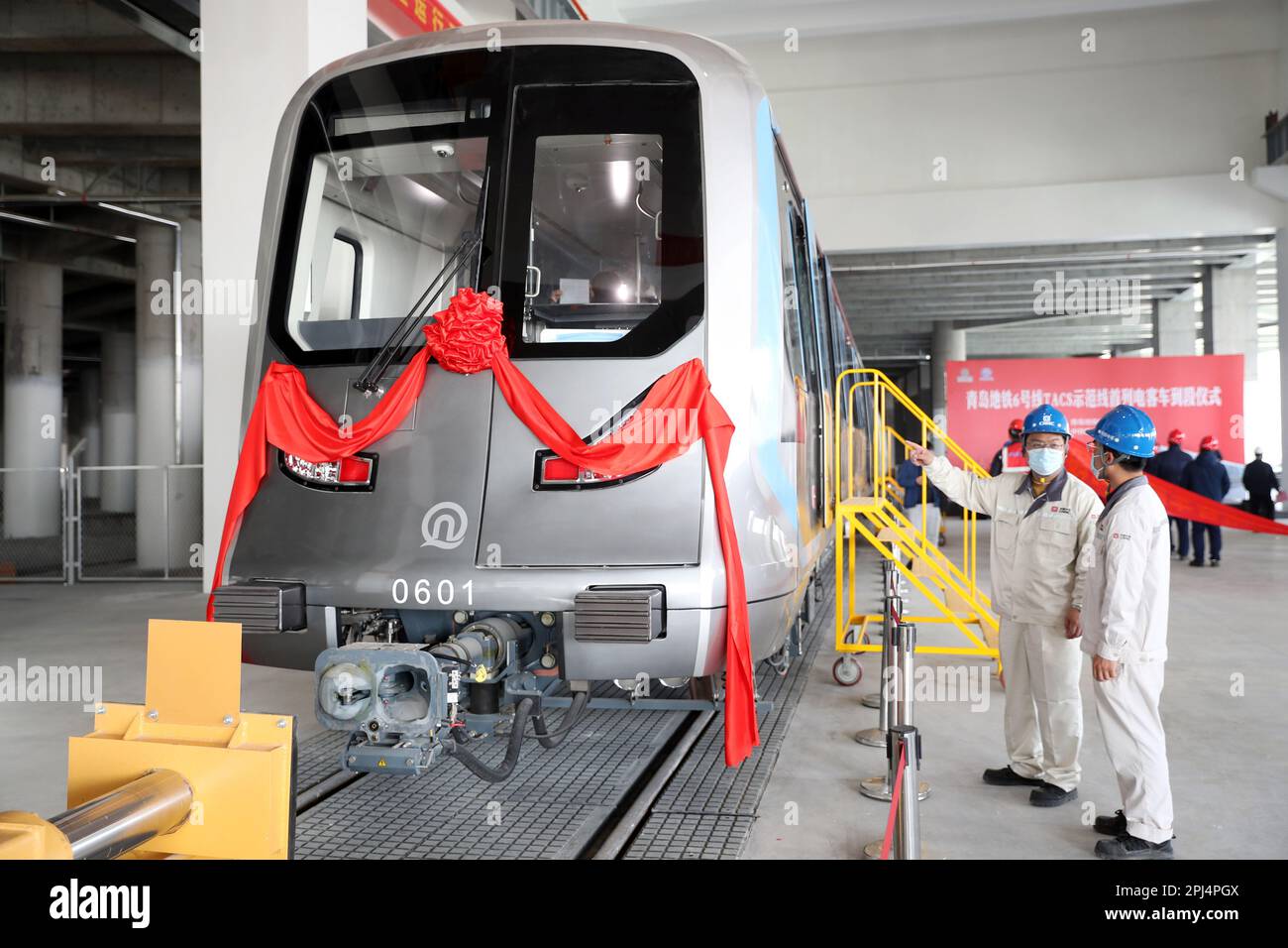 QINGDAO, CHINA - MARCH 31, 2023 - Technicians prepare vehicles in ...