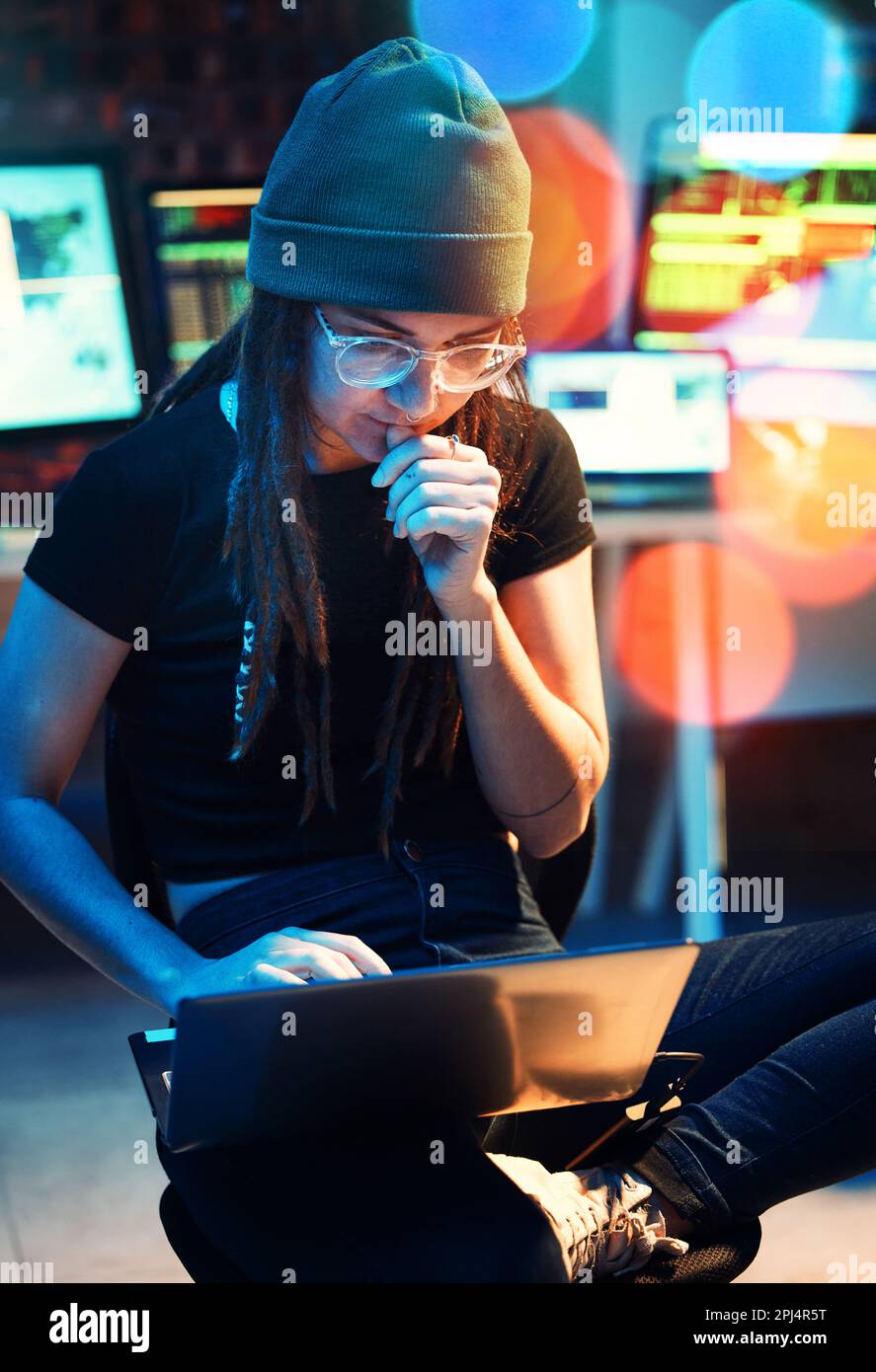 Woman, laptop and hacker thinking, typing or programming, software or ...