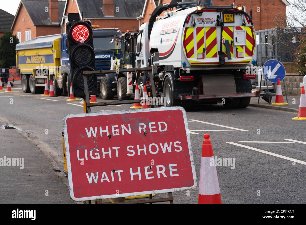 Road works, skid risk, re-surfacing, carriageway, stone chippings, grit ...