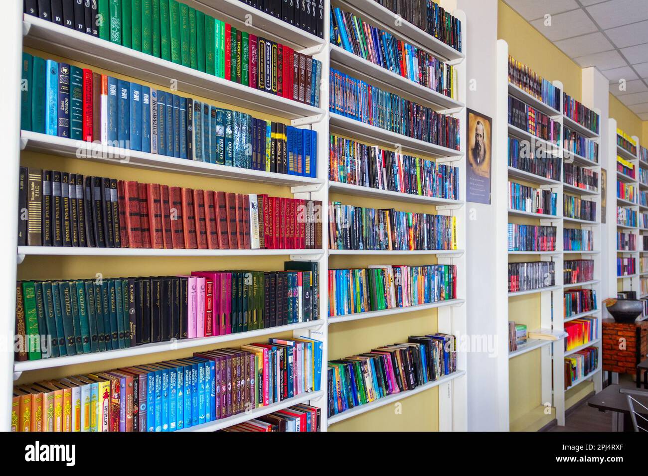 Krasnodar, Russia - February 25, 2023: a wall with shelves with books ...