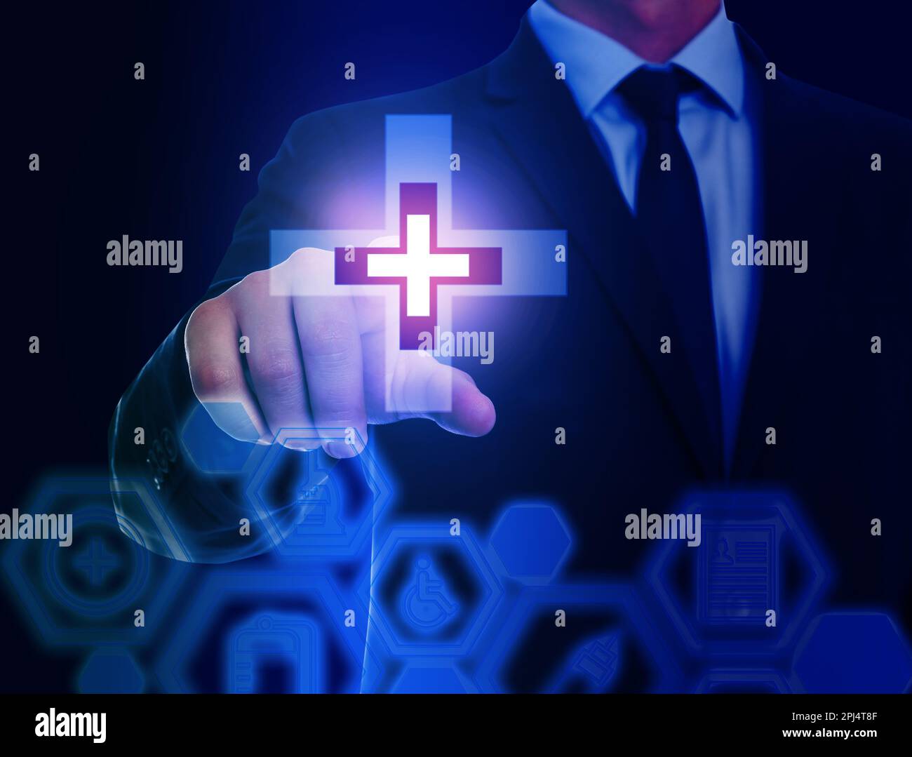 Man pressing virtual first aid button on blue background, closeup ...
