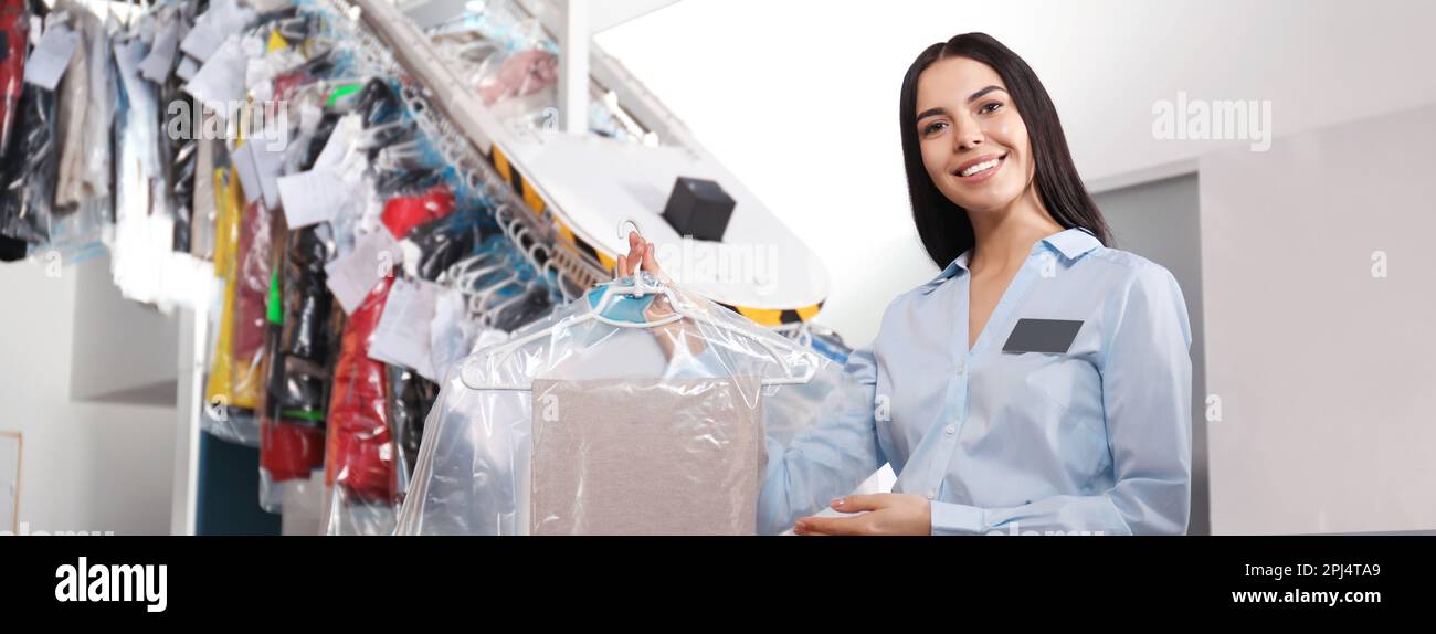 Female worker with clean clothes, banner design. Dry-cleaning service ...