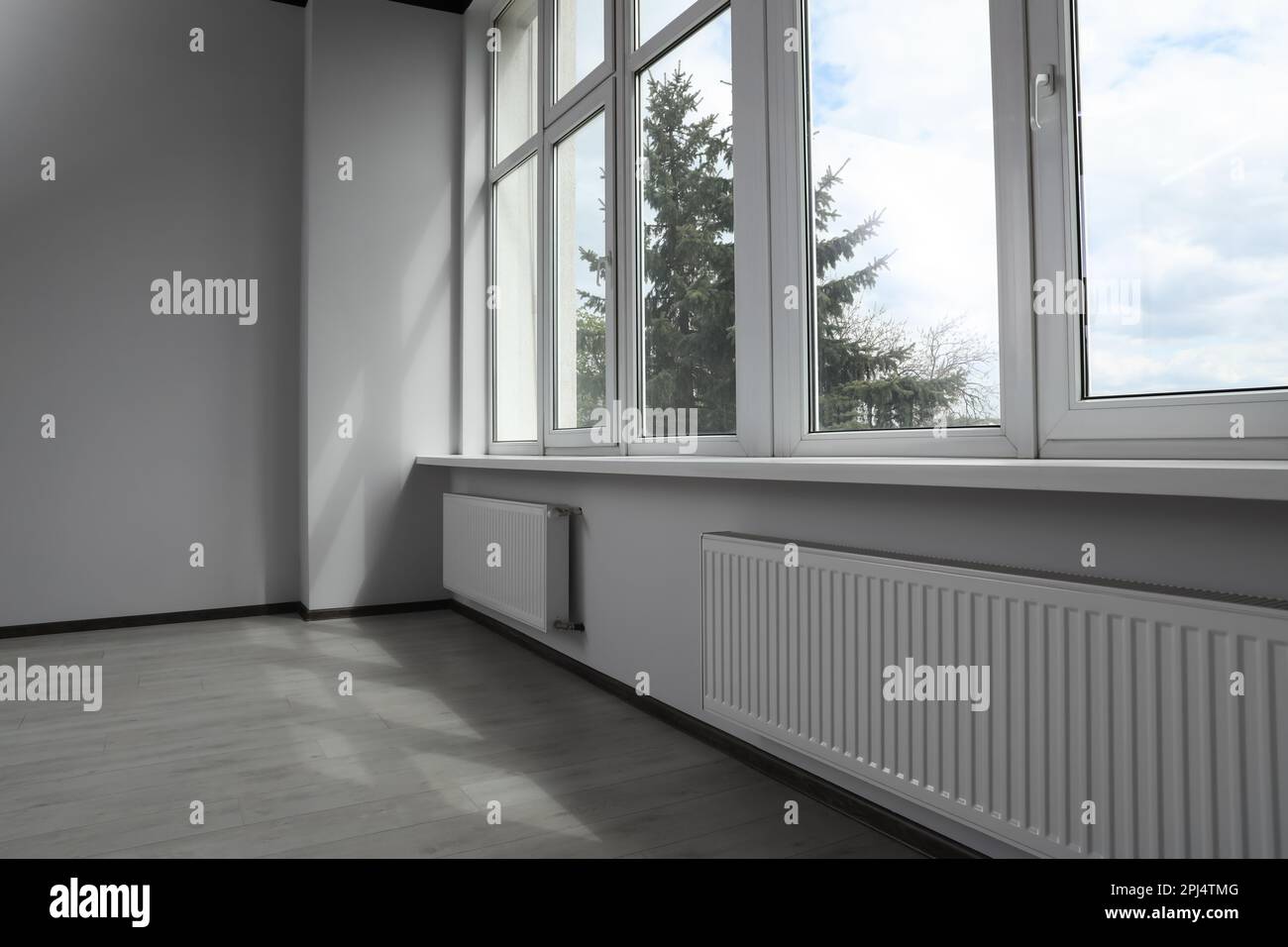 Modern office with window and radiators. Interior design Stock Photo ...