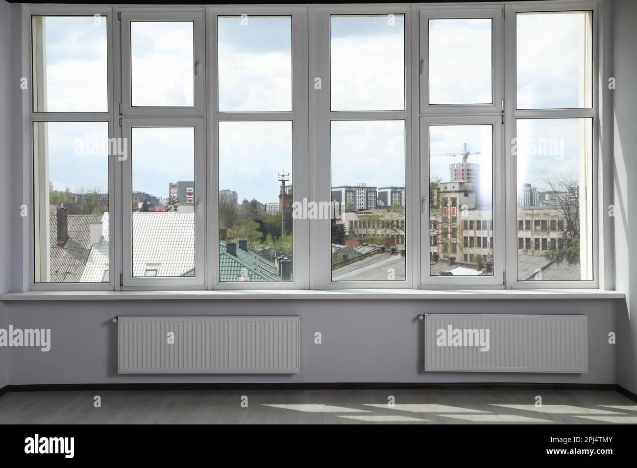 Modern office with window and radiators. Interior design Stock Photo ...